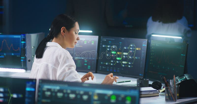 Female it Technical Specialist Works on Computer with Data Server Stock ...