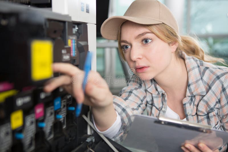Female Technician Checking Printer Stock Photo - Image of machine ...