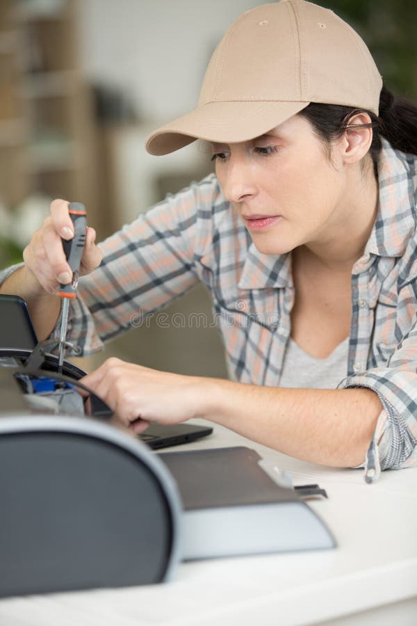 Female Technician Repairing Computer Stock Photo - Image of tech, happy ...