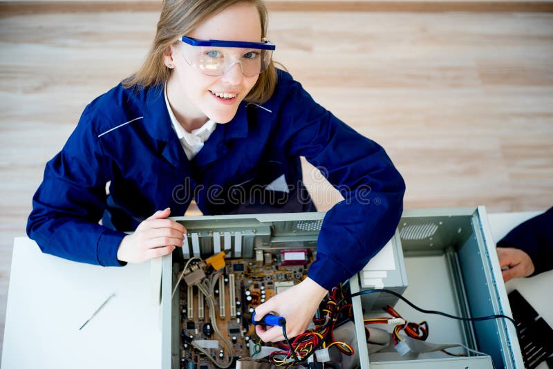 Female Technician Repairing a Computer Stock Image - Image of ...