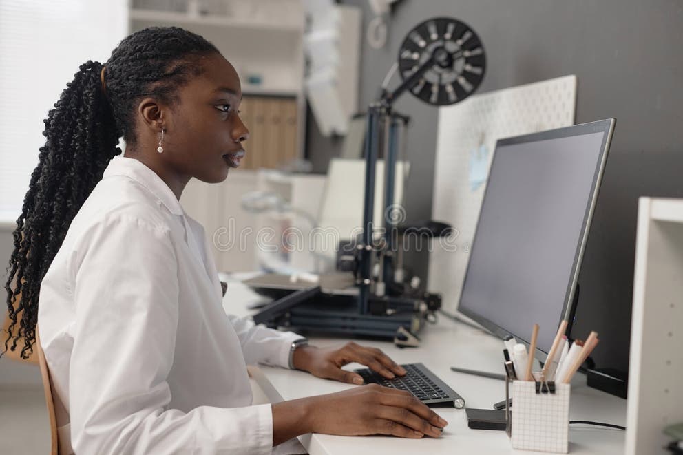 Female Technician Using Computer in Laboratory Stock Photo - Image of ...