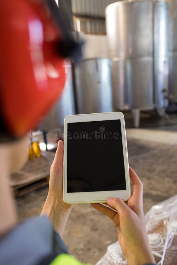 Female Technician Using Digital Tablet Stock Image - Image of ...
