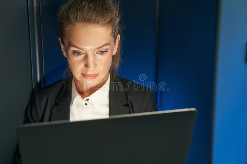 Female Technician Using Laptop To Analyze Server Stock Image - Image of ...