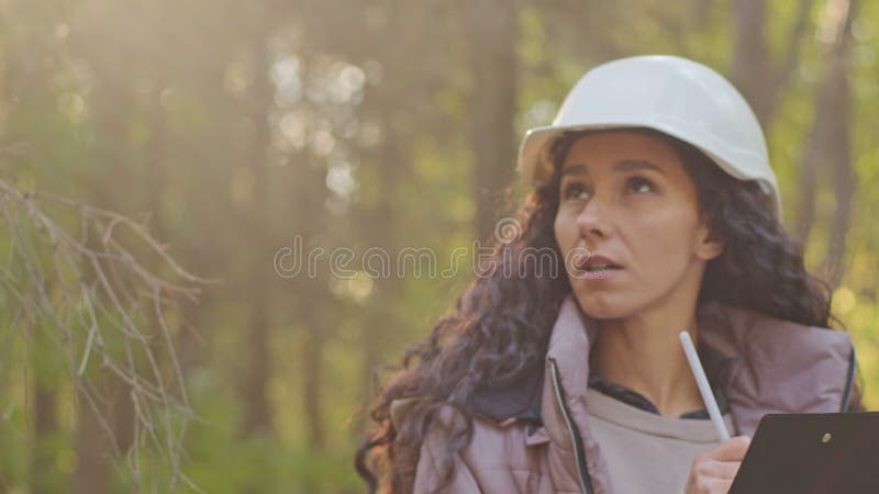 Female Technician Walking, Taking Notes on Clipboard Notepad Paper in ...