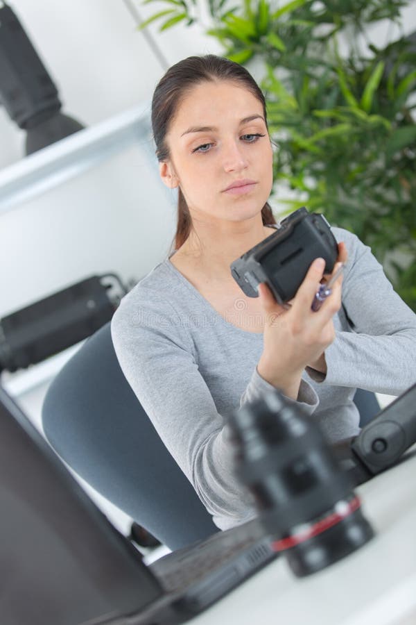 Female Technician Working on Camera Component Stock Image - Image of ...