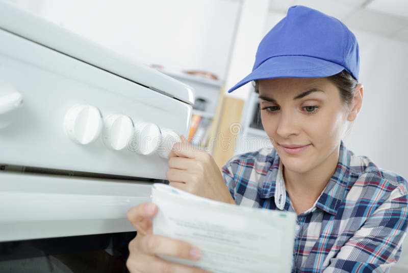Female Technician Working on Electrical Appliance Stock Image - Image ...