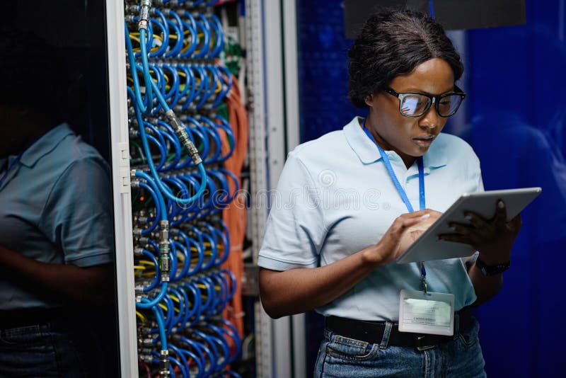 Technician Working on Laptop in Data Center Stock Photo - Image of ...