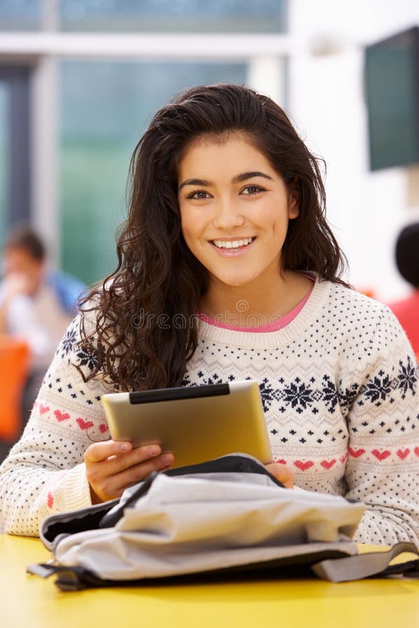 Female Teenage Student in Classroom with Digital Tablet Stock Image ...