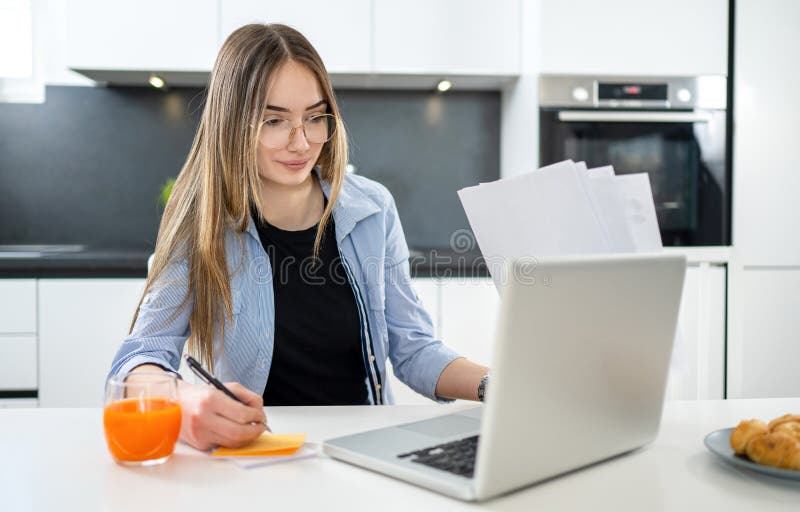 Female Teenage Student Doing Homework at Home. Stock Image - Image of ...