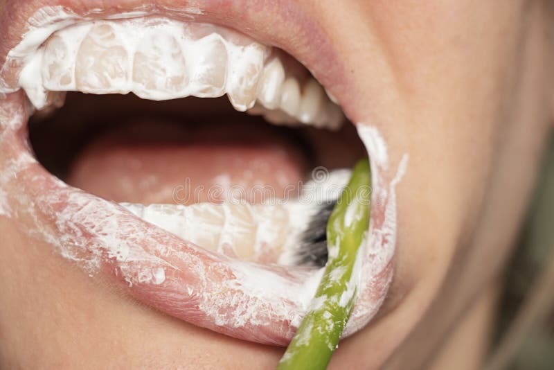 Female Teeth in Toothpaste Brushing Teeth Close-up Stock Image - Image ...