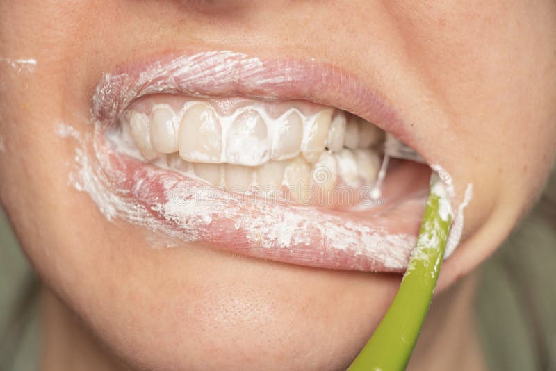 Female Teeth In Toothpaste Brushing Teeth Close-up Stock Photo - Image ...