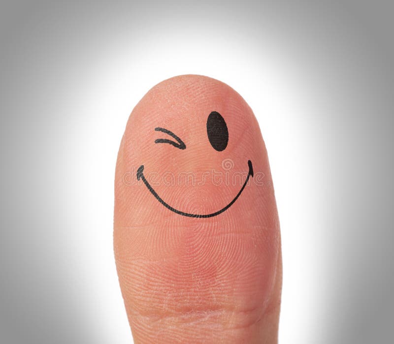 Female thumbs with smile face on the finger, Female thumbs with smile ...