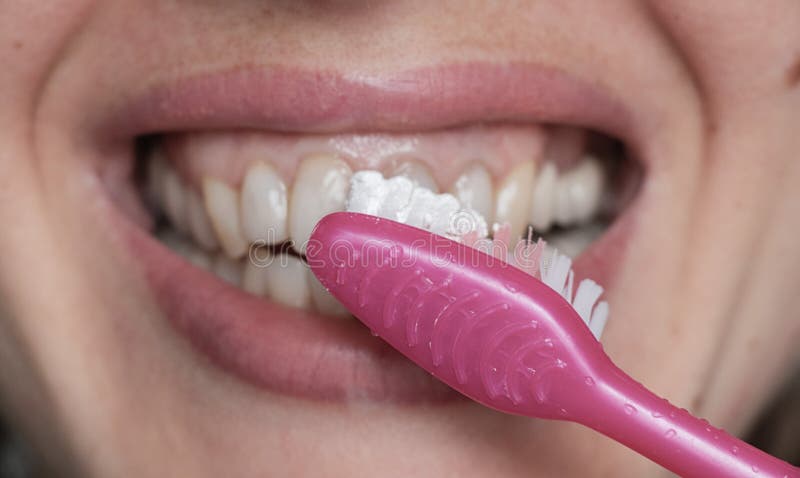 Female Lips Smeared with Toothpaste and a Toothbrush, Brushing Teeth ...
