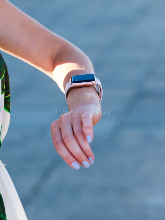 Female Touching Her Smartwatch Stock Image - Image of watch, wirstwatch ...