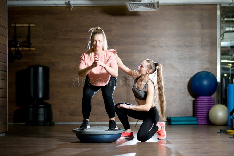 Female Trainer Controls Balancing Technique Stock Photo - Image of ...