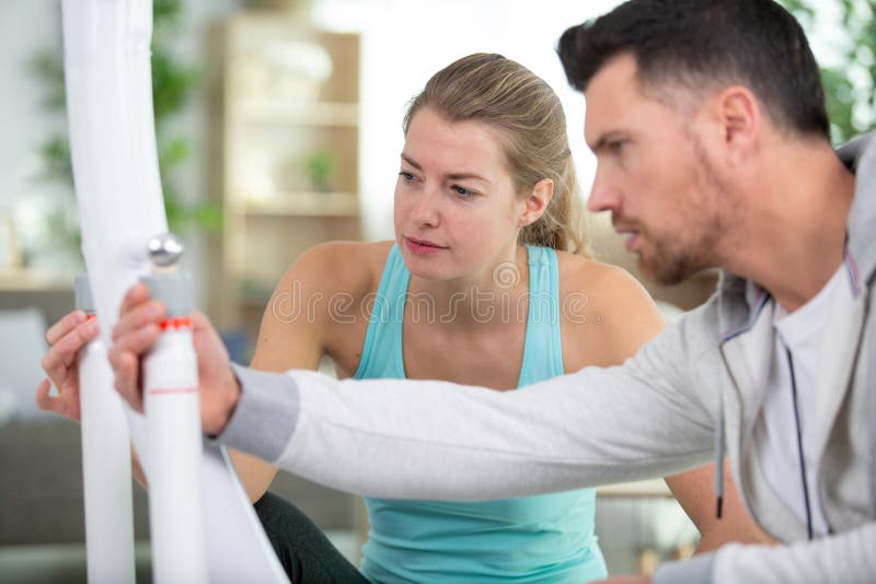 Female with Trainer Doing Workout Exercise in Gym Stock Photo - Image ...