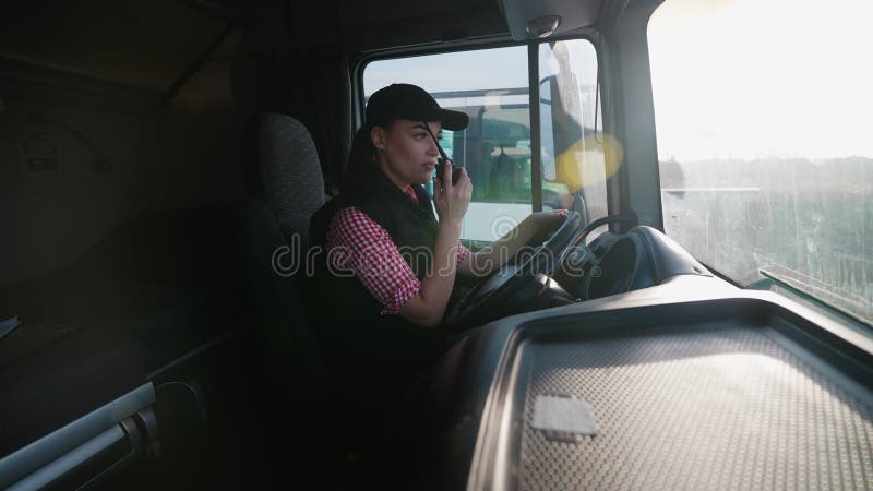 Female Truck Driver Using Radio in Cabin before Trip Stock Video ...