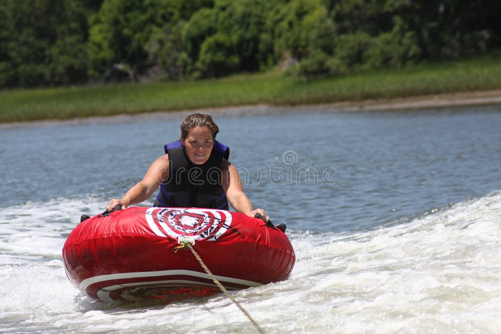 Female tubing stock image. Image of swimming, active - 10445983