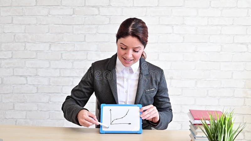 A Female Tutor Explains the Rules for Building a Schedule. Stock Video ...