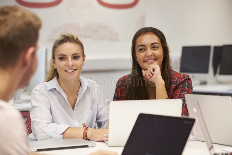 Female University Students Collaborating on Project Stock Photo - Image ...