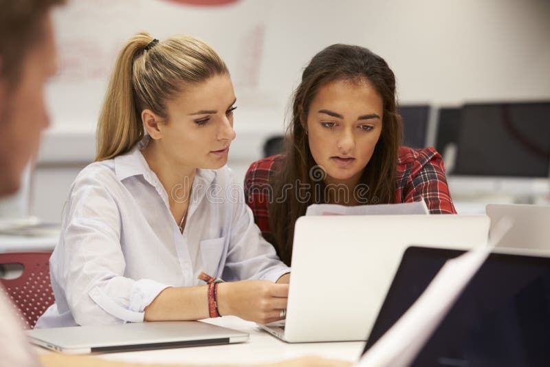 Female University Students Collaborating on Project Stock Image - Image ...