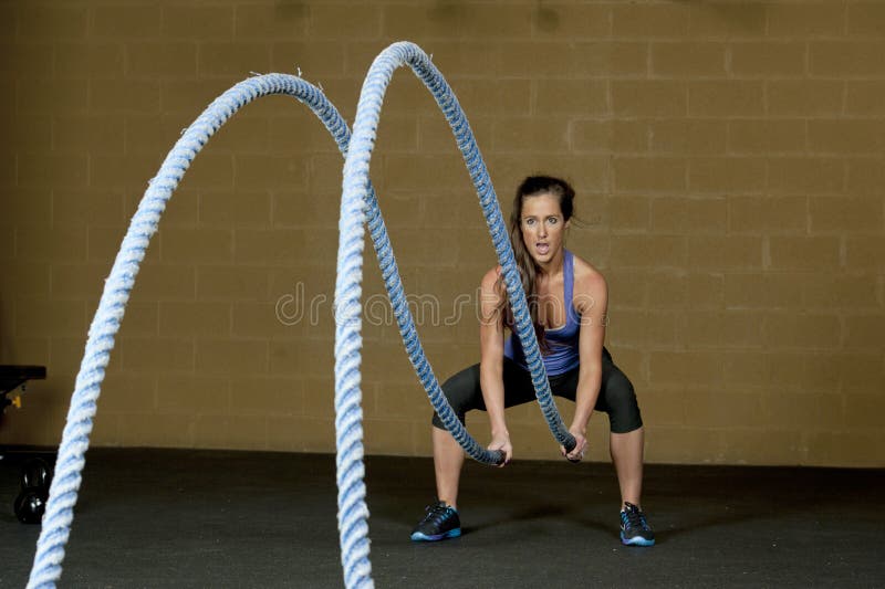 Female Using Training Ropes Stock Image - Image of energy, beauty: 52319095