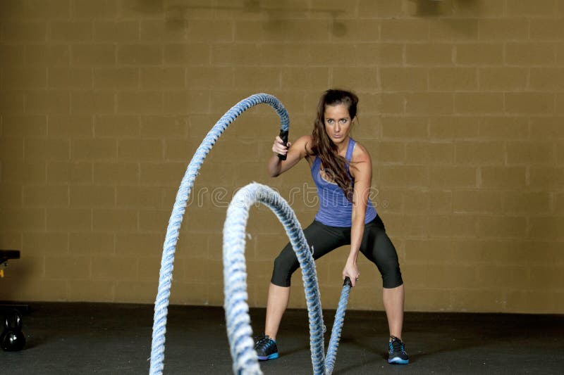 Female Using Training Ropes Stock Photo - Image of exercise, body: 52322840