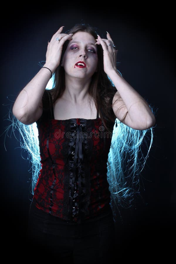 Female Vampire with Long Hair Stock Image - Image of creature, fangs ...