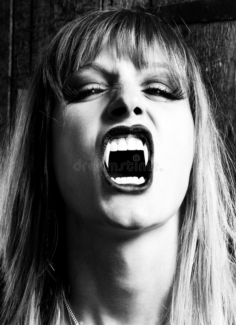 Female Vampire Showing Fangs Stock Photos - Free & Royalty-Free Stock ...