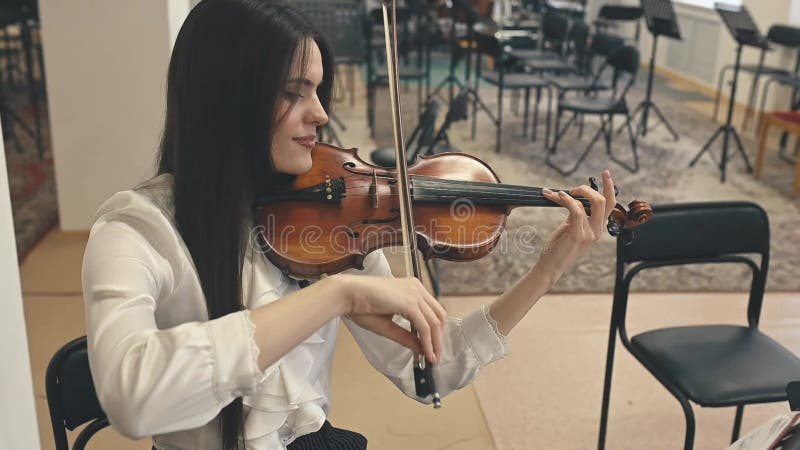 Female Violinist Blends Music with Grace, Delivering a Classic ...