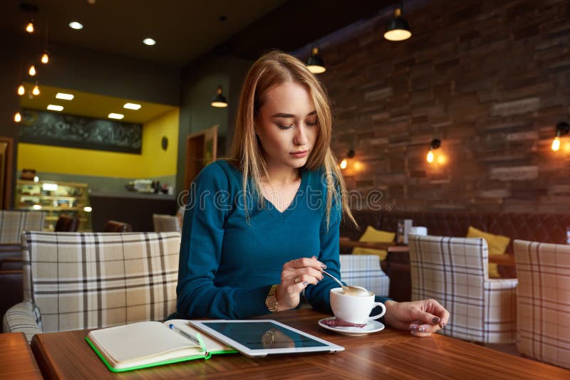 Female is Waiting Restart Tablet Computer To Continue Working in the ...