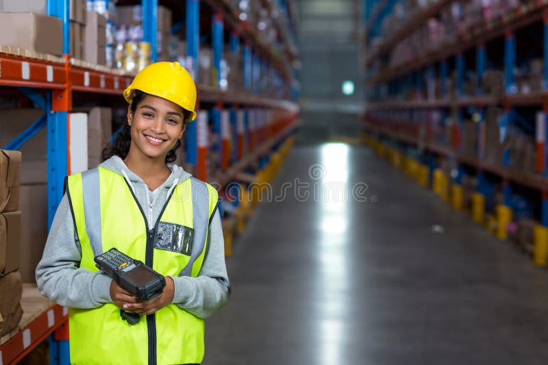 Female Warehouse Worker Using Barcode Scanner in Warehouse Aisle with ...