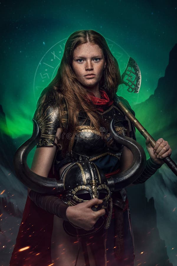 Female Warrior with Helmet and Axe Dressed in Armor Against Polar ...