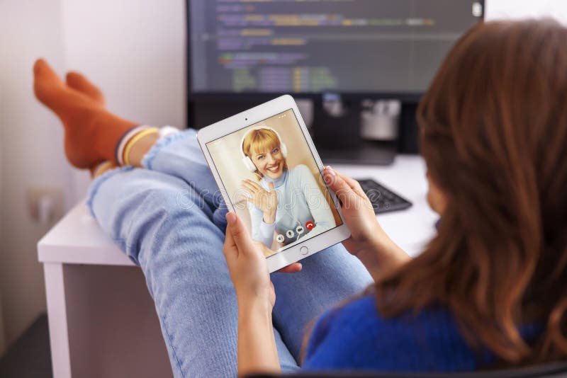Female Web Developer Having Video Call while Working in Home Office ...