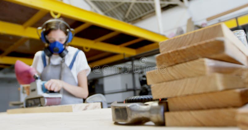 Female Welder Using Wood Sanding Machine 4k Stock Footage - Video of ...