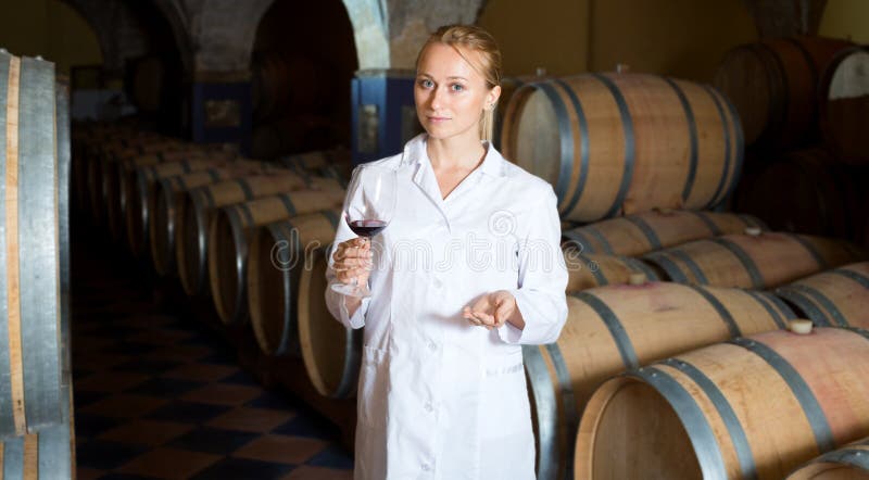 Female Wine House Worker Checking Quality of Product Stock Photo ...