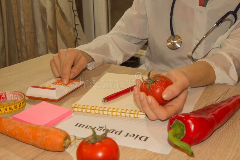 Female Woman Nutritionist Holding Fresh Vegetables And Fruit Stock