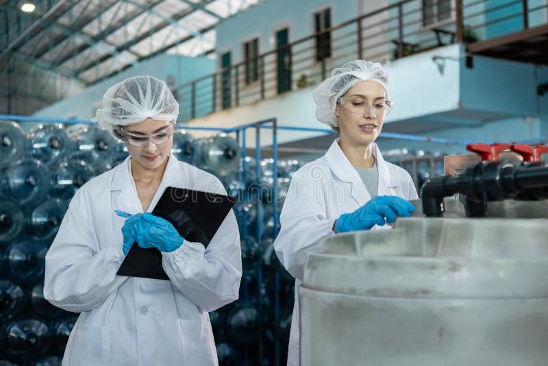 Female Worker Checking Quality Process of Filtering Cleanliness ...