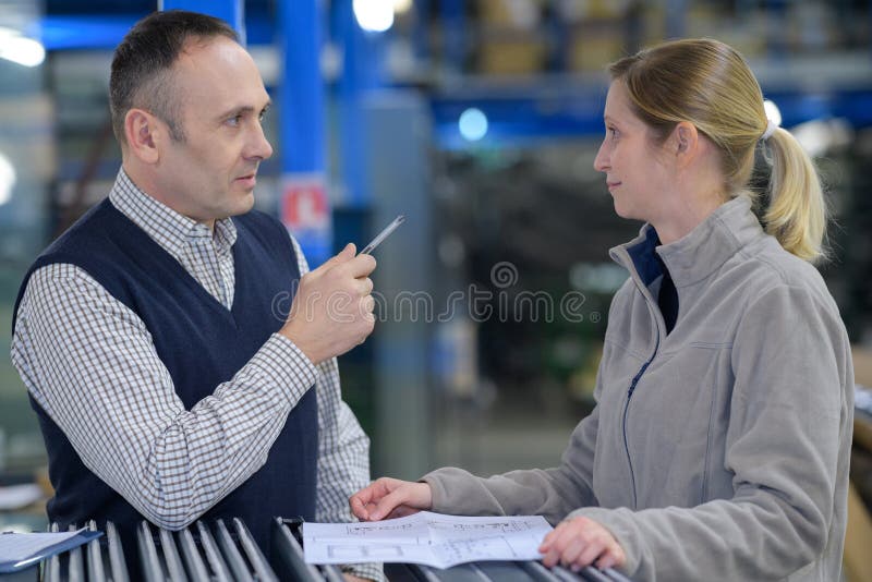 Female Worker Holding Blueprint Stock Image - Image of design, manager ...