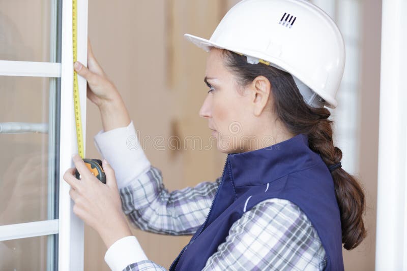 Female Worker Measure Window Stock Photo - Image of hard, duty: 259684334