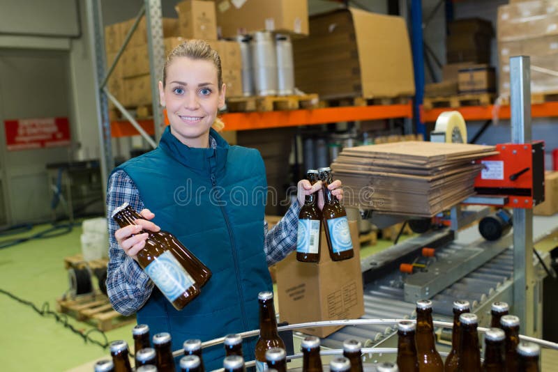 Female Worker Operating Assembly Line Production Beer Stock Image ...