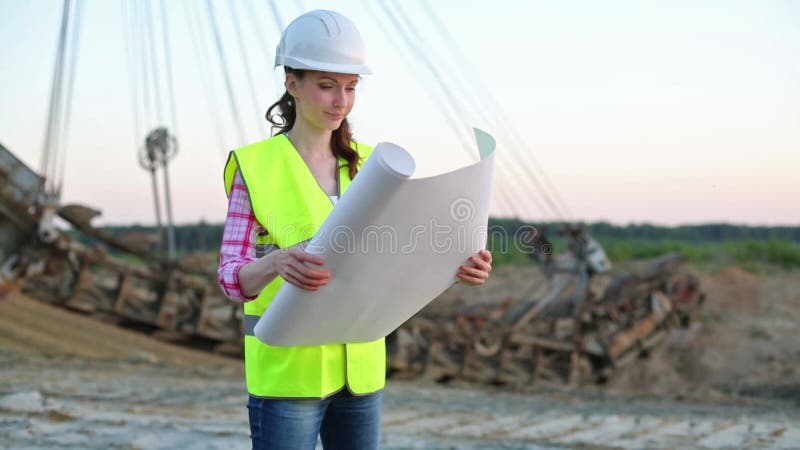 Female Worker Stands with Drawings on a of Career Stock Footage - Video ...