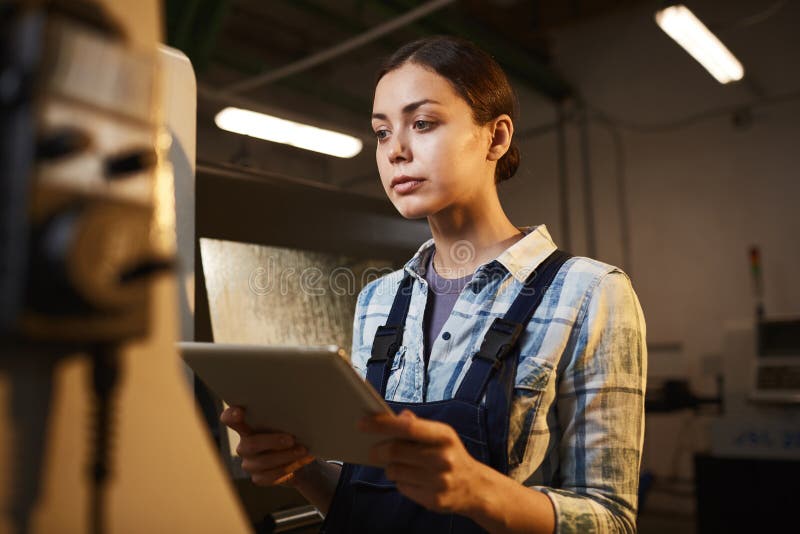 Female Worker Using Tablet Pc in the Plant Stock Photo - Image of ...
