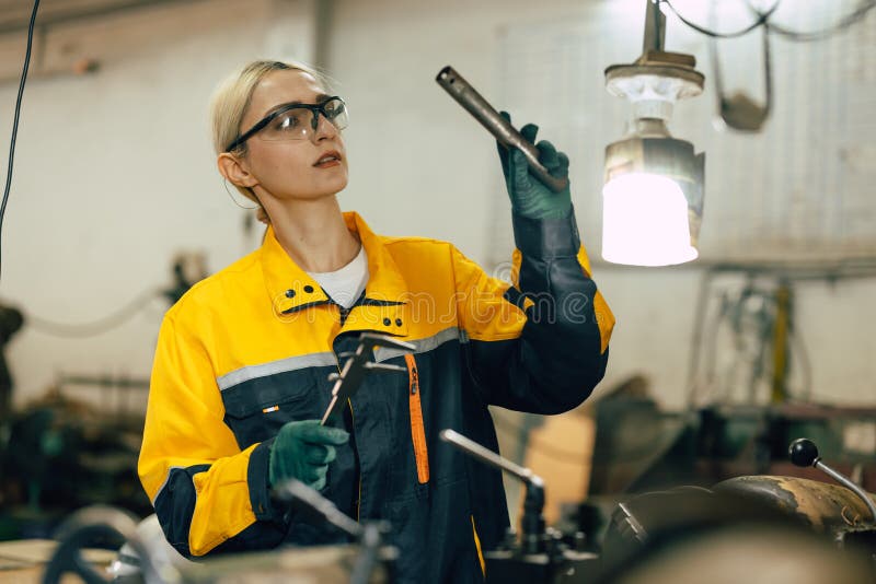 Female Worker Using Vernier Caliper Measuring Metal Part in Lathe ...