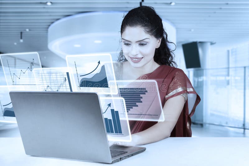 Female Worker with Virtual Graph in Office Stock Photo - Image of ...