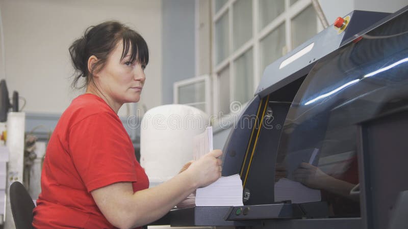 Female Worker Working with the Printing Press Stock Image - Image of ...