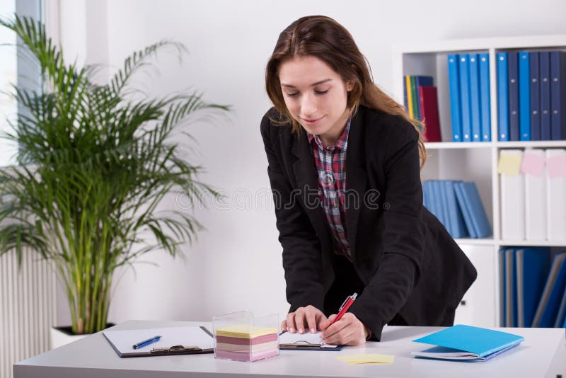 Female Worker Writes Down Ideas Stock Photo - Image of notes, office ...