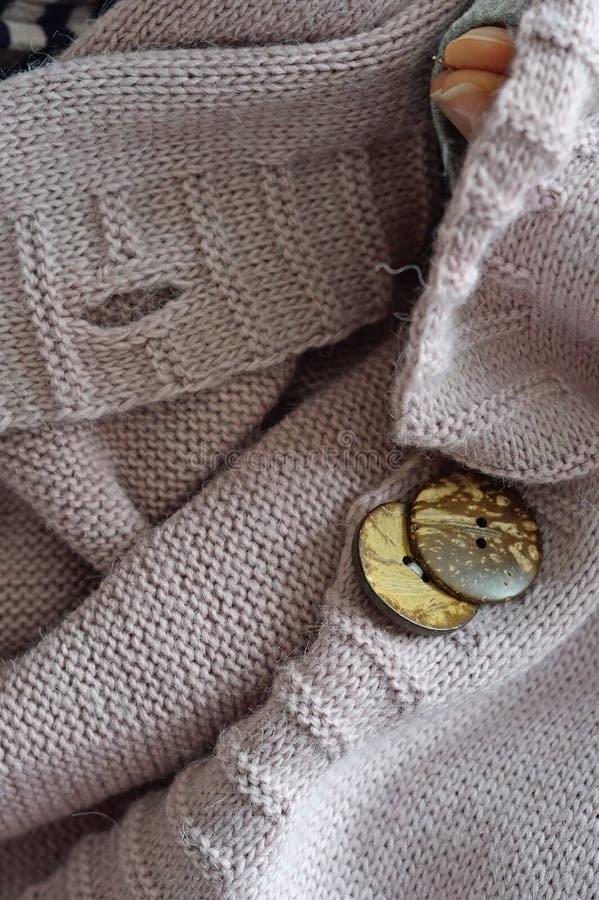 Female Workers` Hands Sew a Wooden Button To a Jacket. Close-up Stock ...