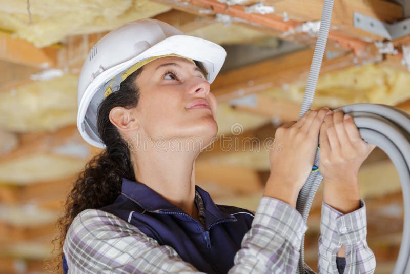 Female Working with Cables Indoors Stock Image - Image of electricity ...