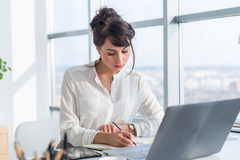 Female Writer Typing Using Laptop Keyboard at Her Workplace in the ...